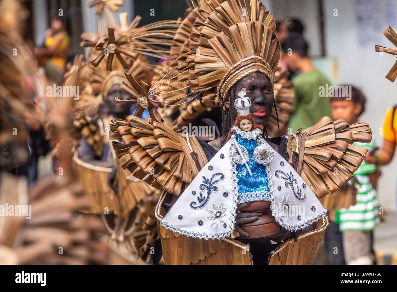 Ibajay Ati-Ati Festival participant in black face to honor the Ati ...