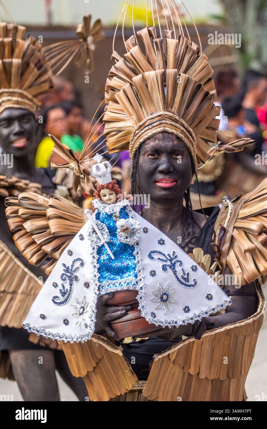 Ibajay Ati-Ati Festival participant in black face to honor the Ati ...