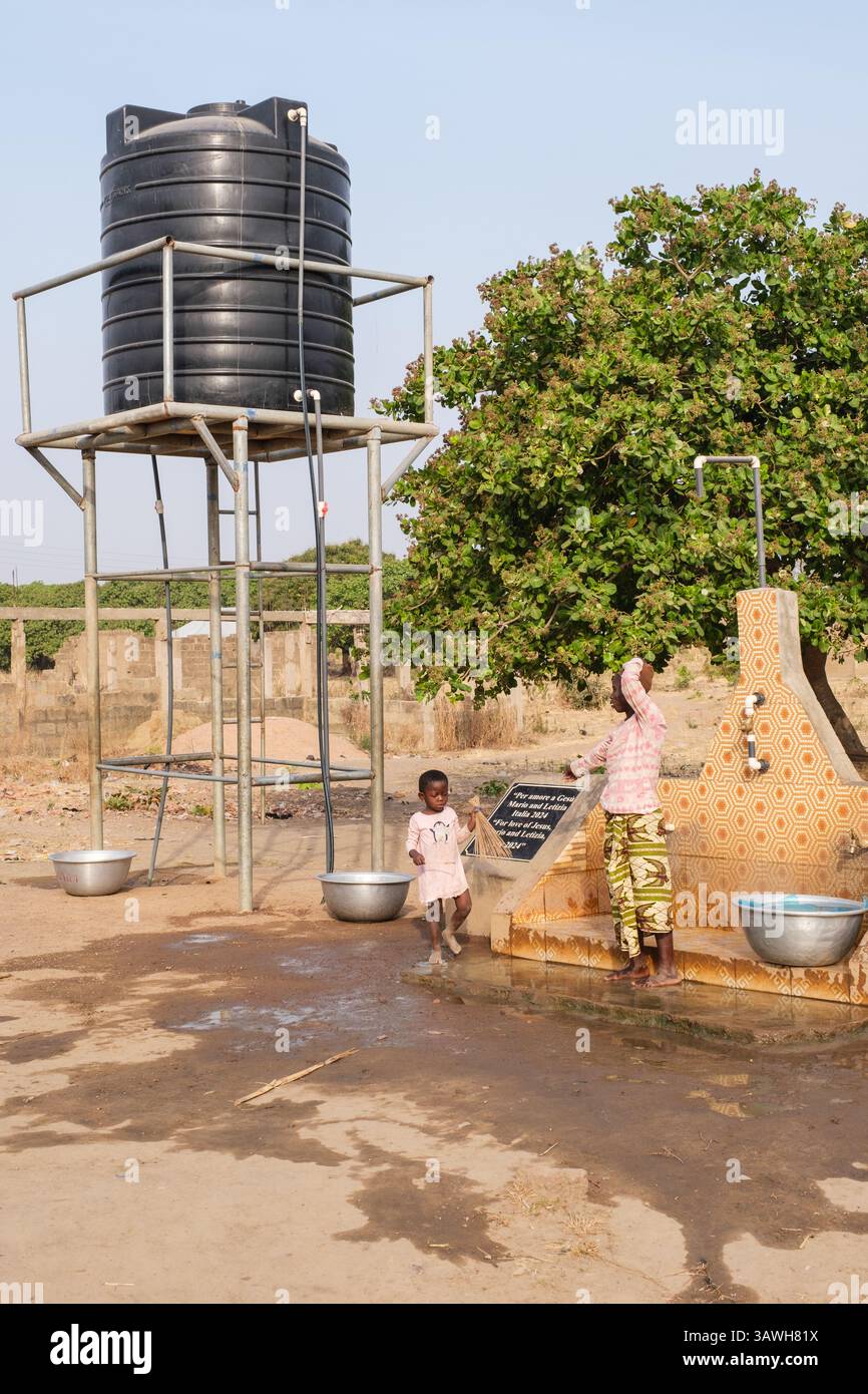 Sonyo, Ghana. Black Storage Tank Stores water pumped to tank from well ...