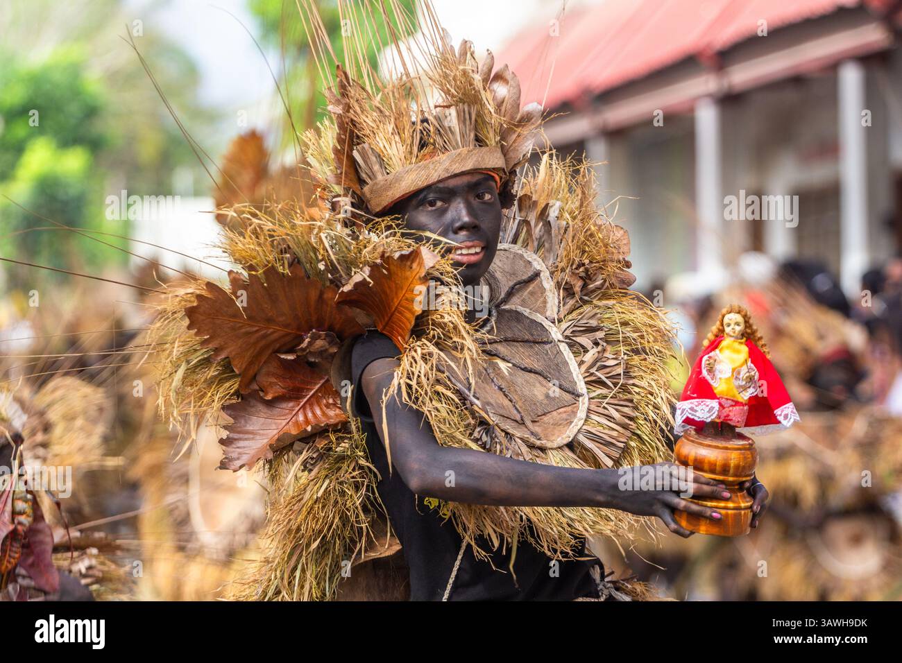 Ibajay Ati-Ati Festival participant in black face to honor the Ati ...