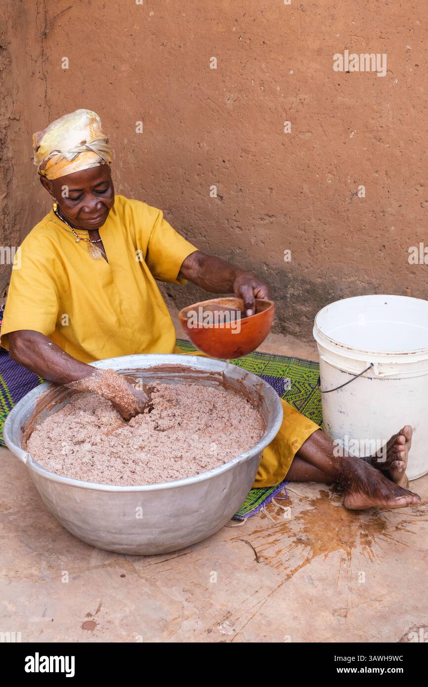 Ghana, Mognori. Shea Butter Production. Adding Water to the Paste ...