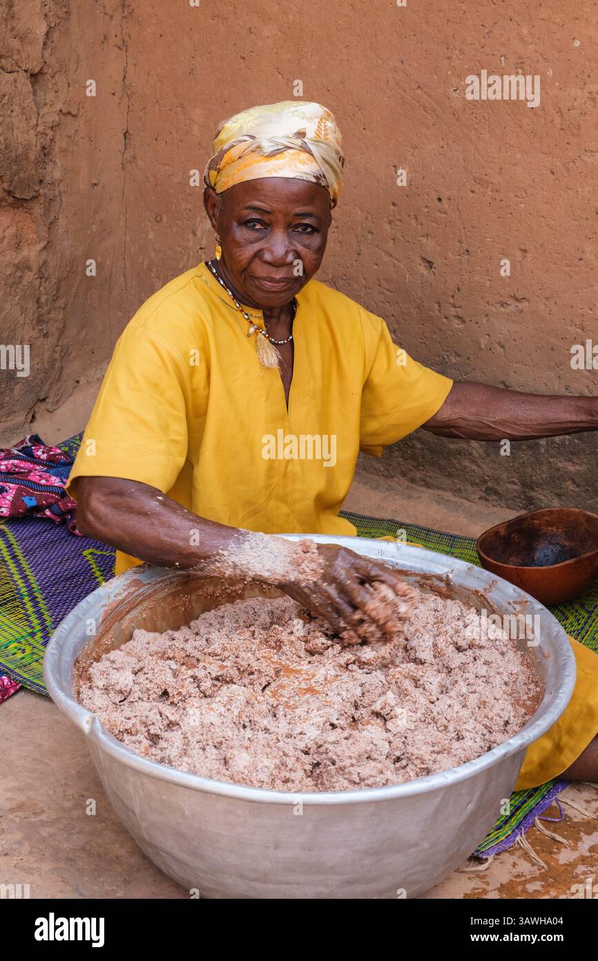 Ghana, Mognori. Shea Butter Production. Adding Water to the Paste ...