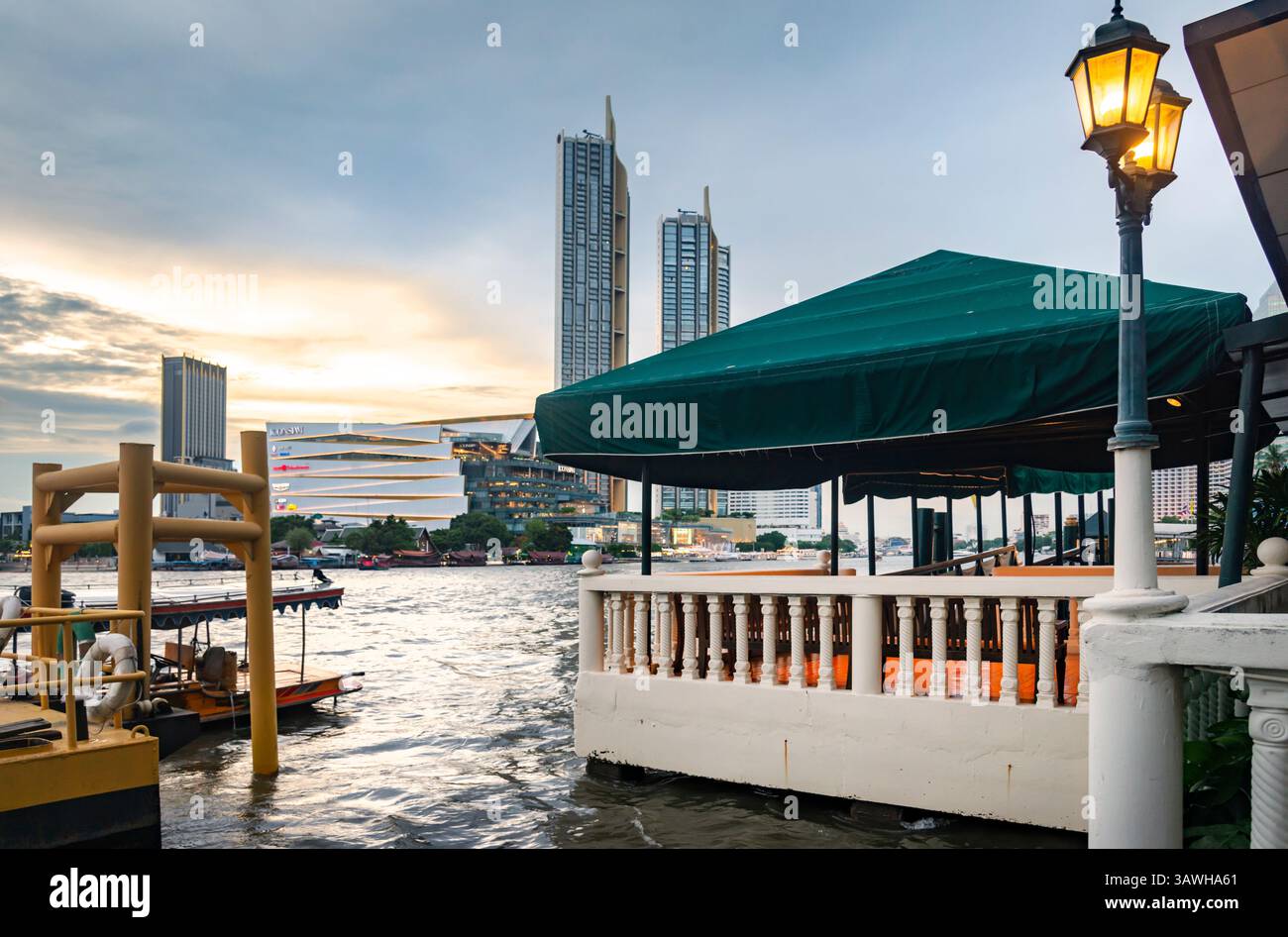 Thailand-July 04 2024: Sunset on the riverside,viewed from a small ...