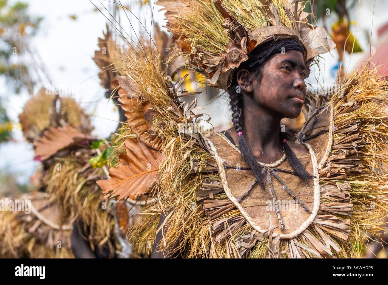 Young Ati-Ati Festival dancers painted black and wearing costumes made ...