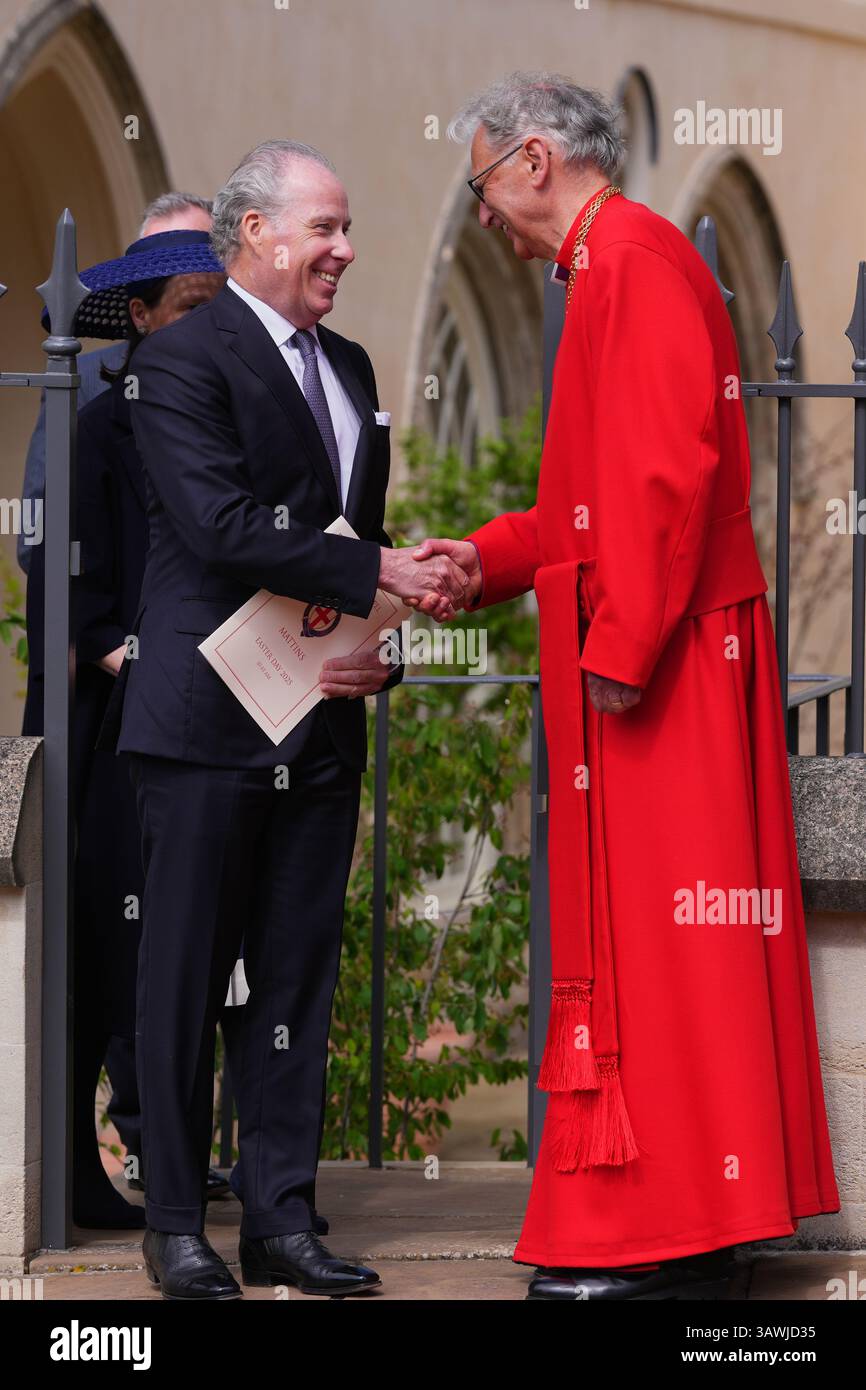The Earl of Snowden shakes hands with the Dean of Windsor, the Right ...