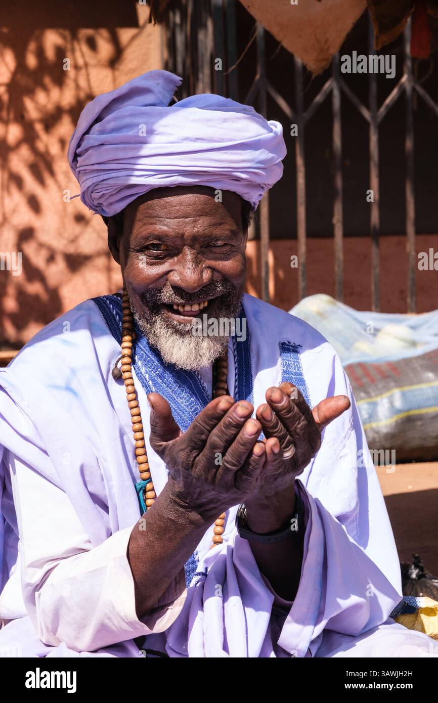 Ghana, Tamale. Muslim Man with Prayer Beads in the Market Stock Photo ...