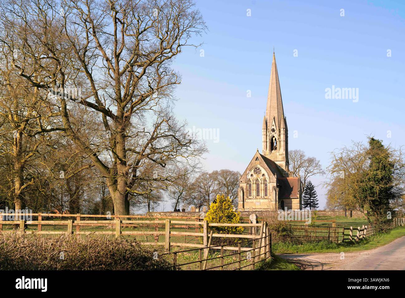 St Leonard's church, circa 1837, surrounded by grass and flanked by ...