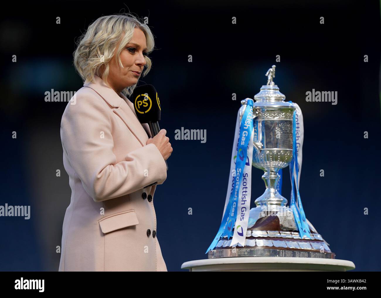 TV presenter Emma Dodds stands next to the Scottish Gas Men's Scottish ...