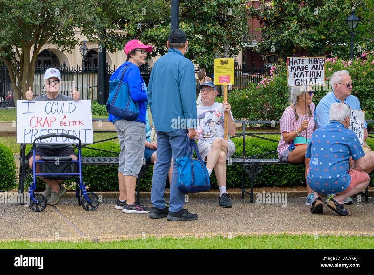 New Orleans, LA, USA - April 19, 2025: Anti-Trump protesters with signs ...