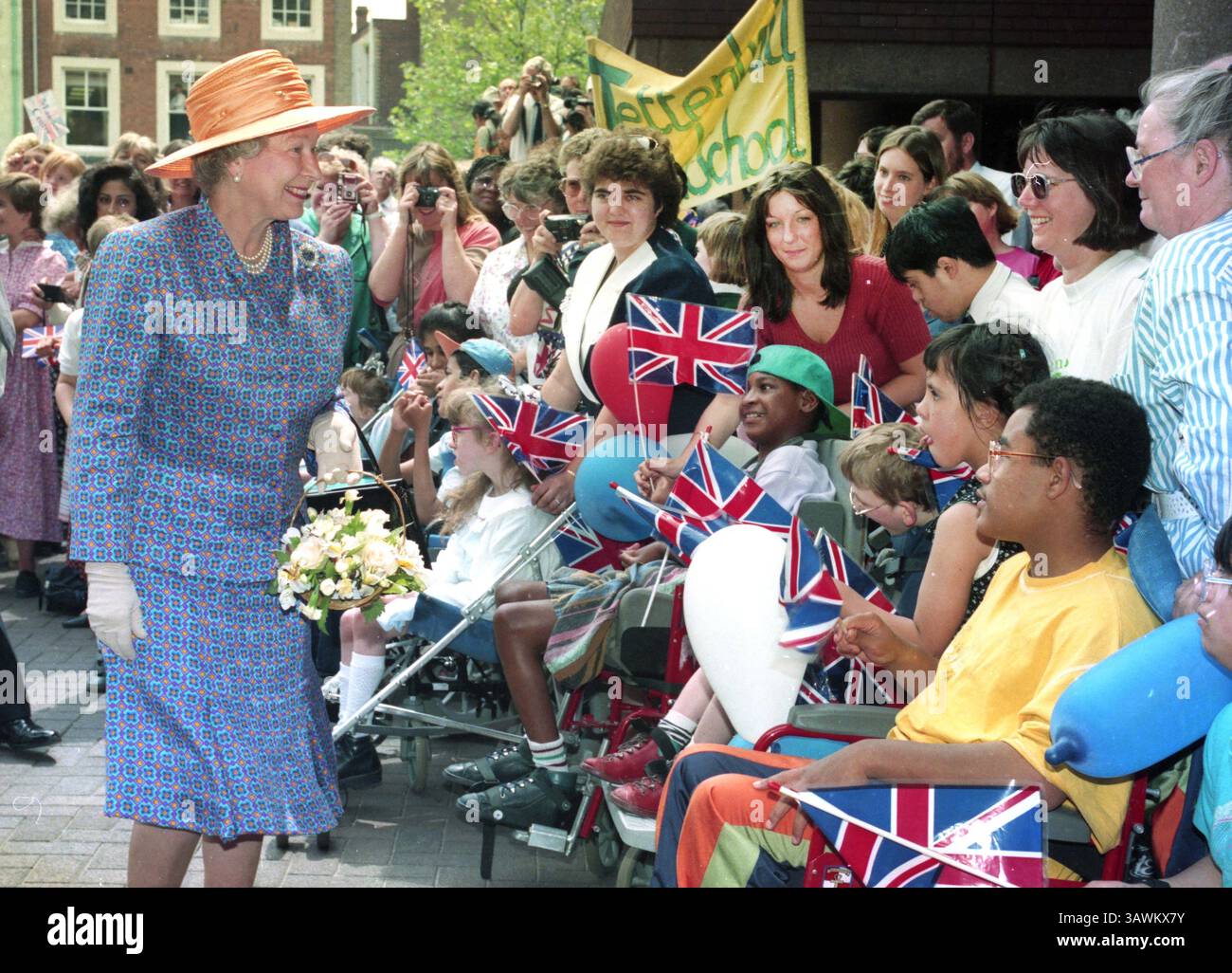 HRH Queen Elizabeth aged 68 talking to children and staff from ...