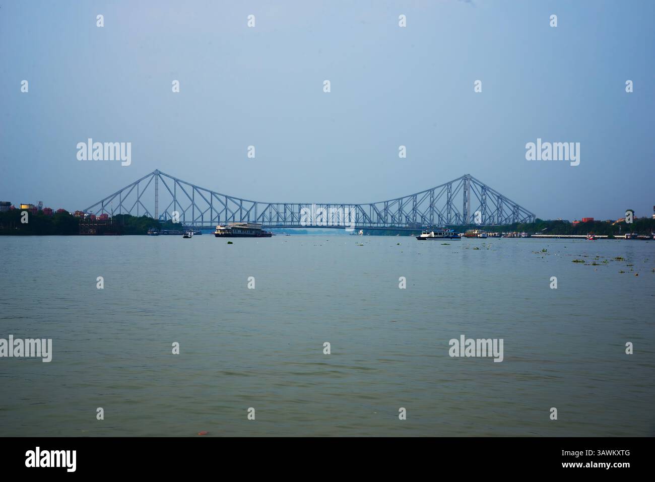 Full view of Howrah bridge or Rabindra Satu from the middle of The ...