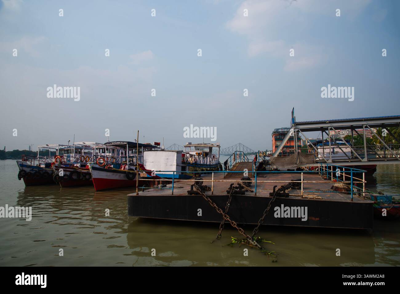 The Howrah Bridge offers a stunning view from Babughat, showcasing its ...