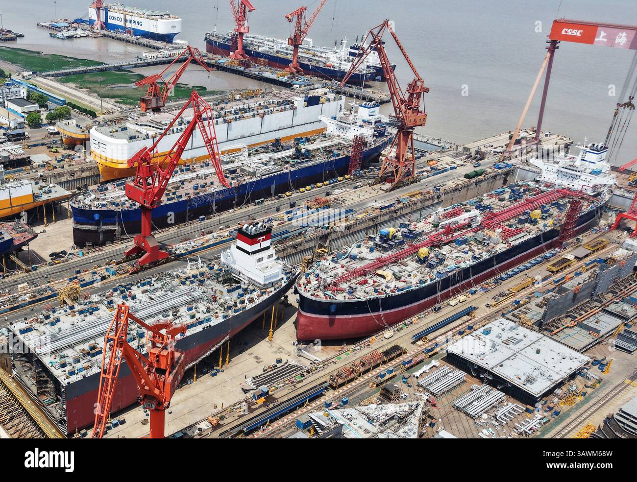 SHANGHAI, CHINA - APRIL 20, 2025 - Various large ships under ...