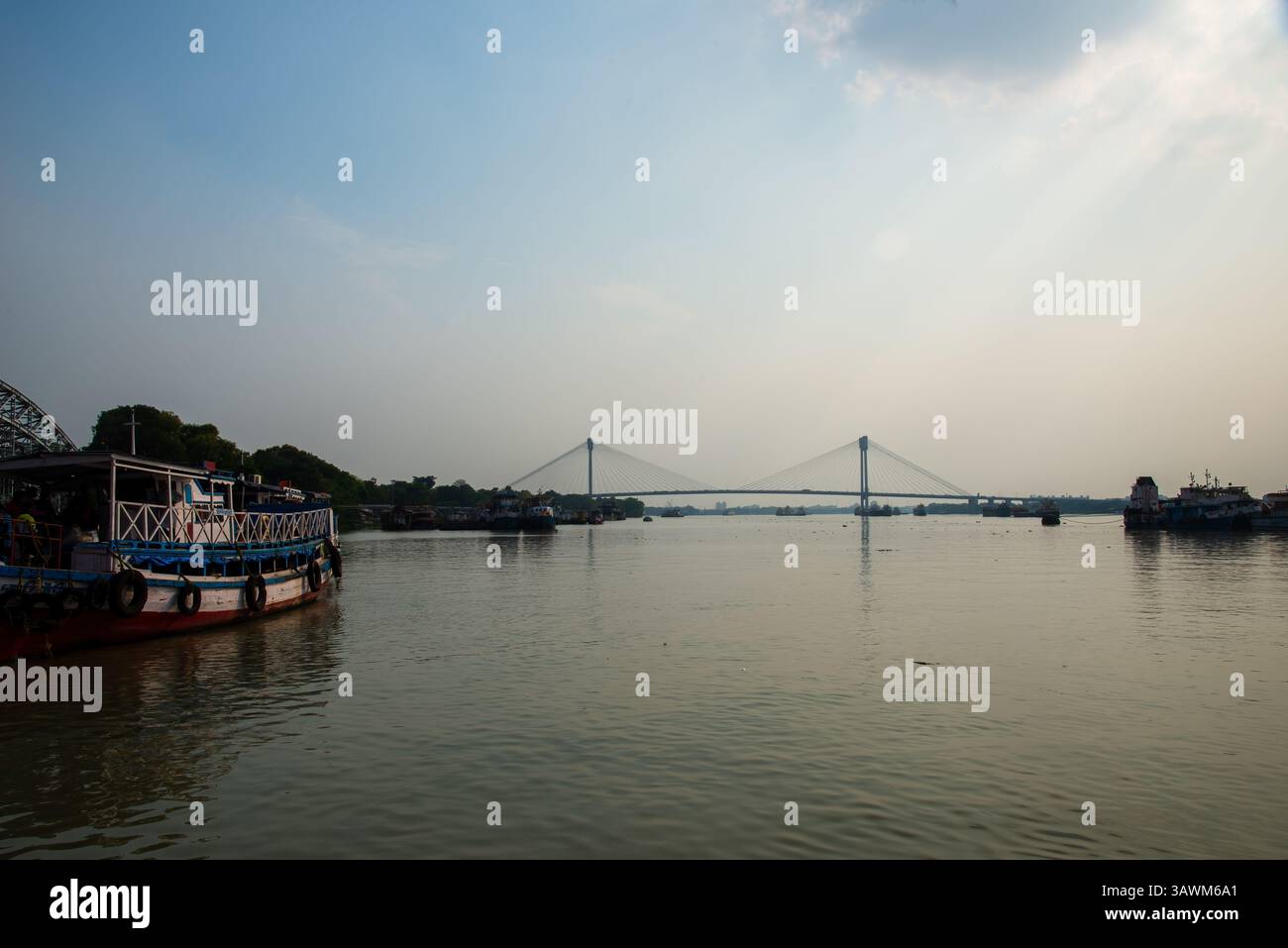The Howrah Bridge offers a stunning view from Babughat, showcasing its ...