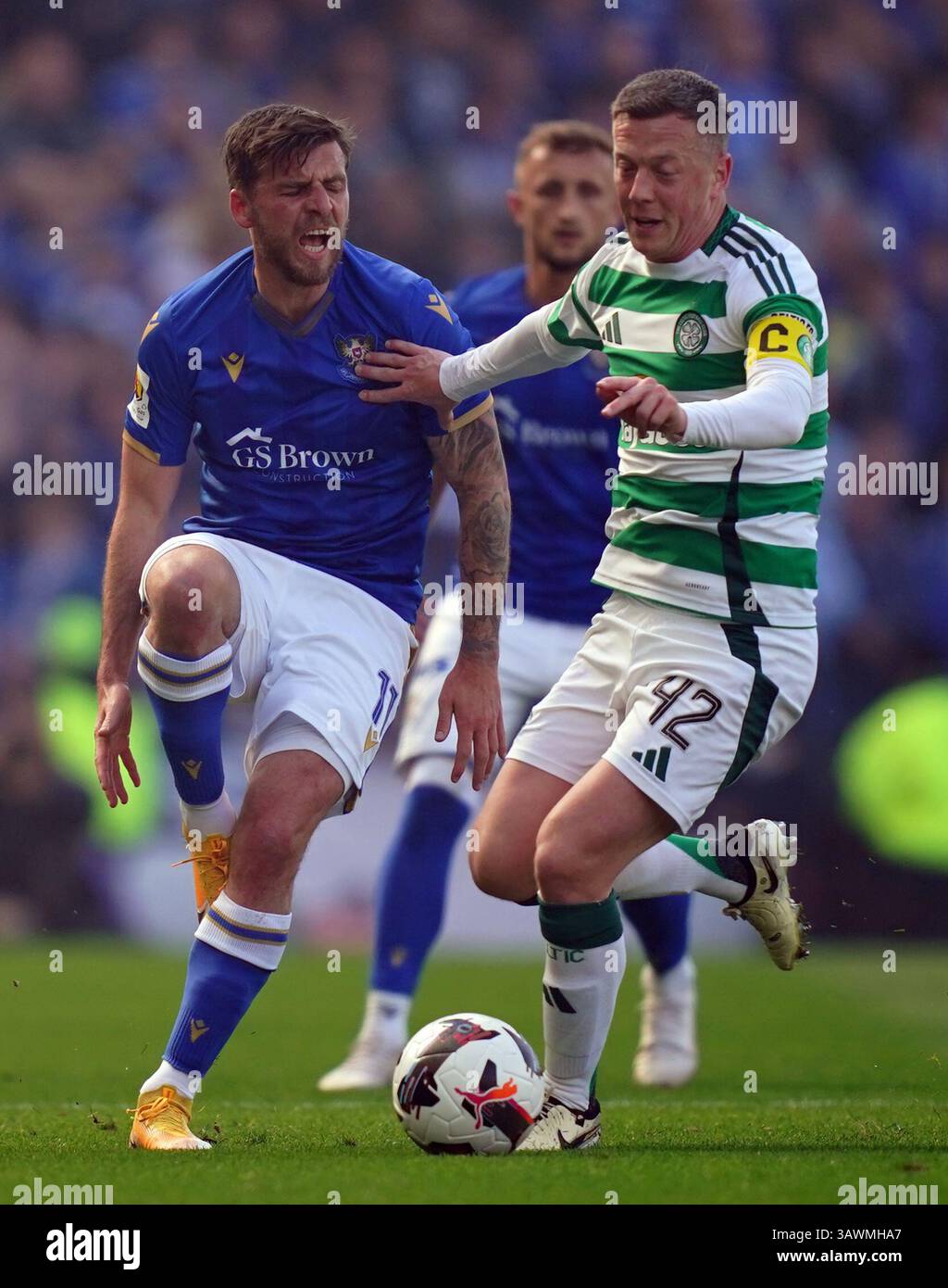 St Johnstone's Graham Carey (left) and Celtic’s Callum McGregor battle ...