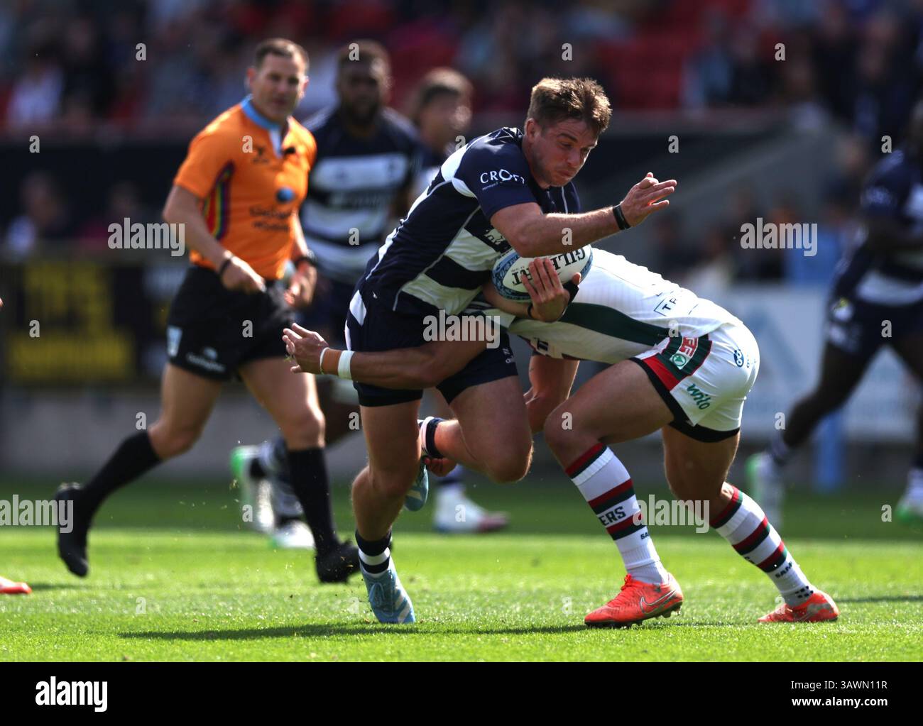 Bristol Bears' AJ MacGinty tackled by Leicester Tigers' Handre Pollard ...