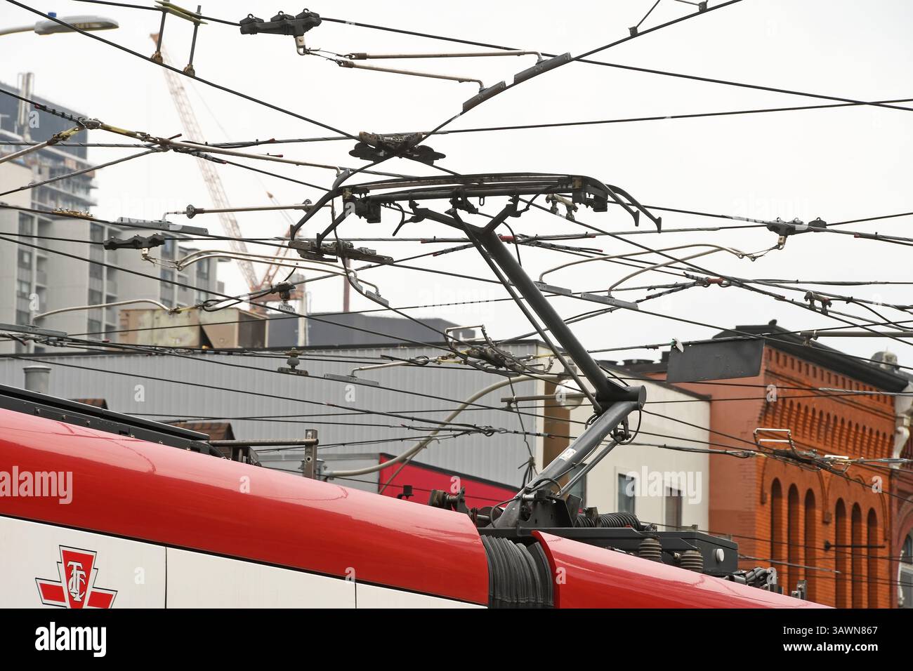 Electric streetcar, electric cables net, Toronto, Canada Stock Photo ...