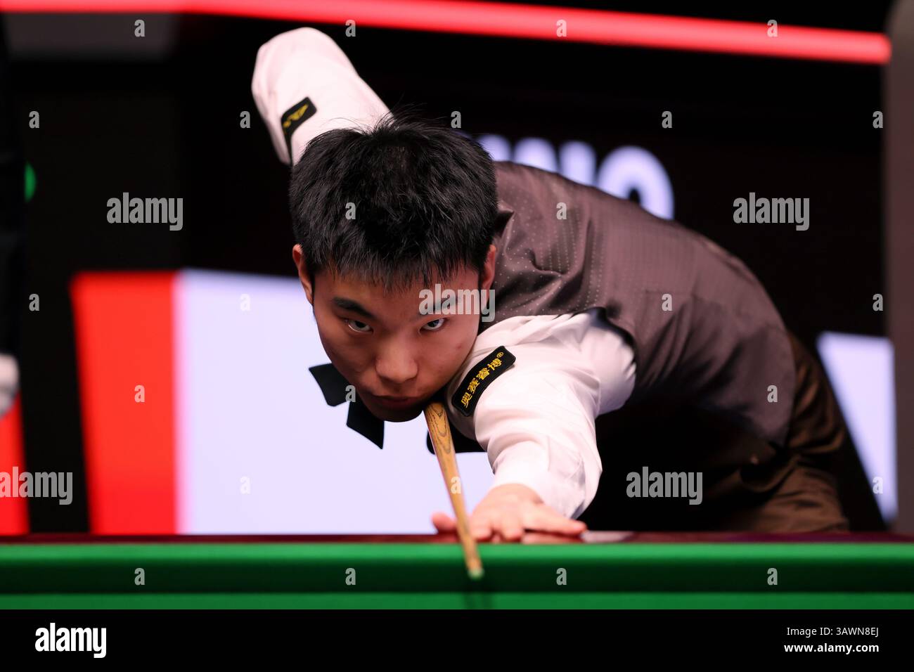 Fan Zhengyi during his match against Mark Allen (not pictured) during ...