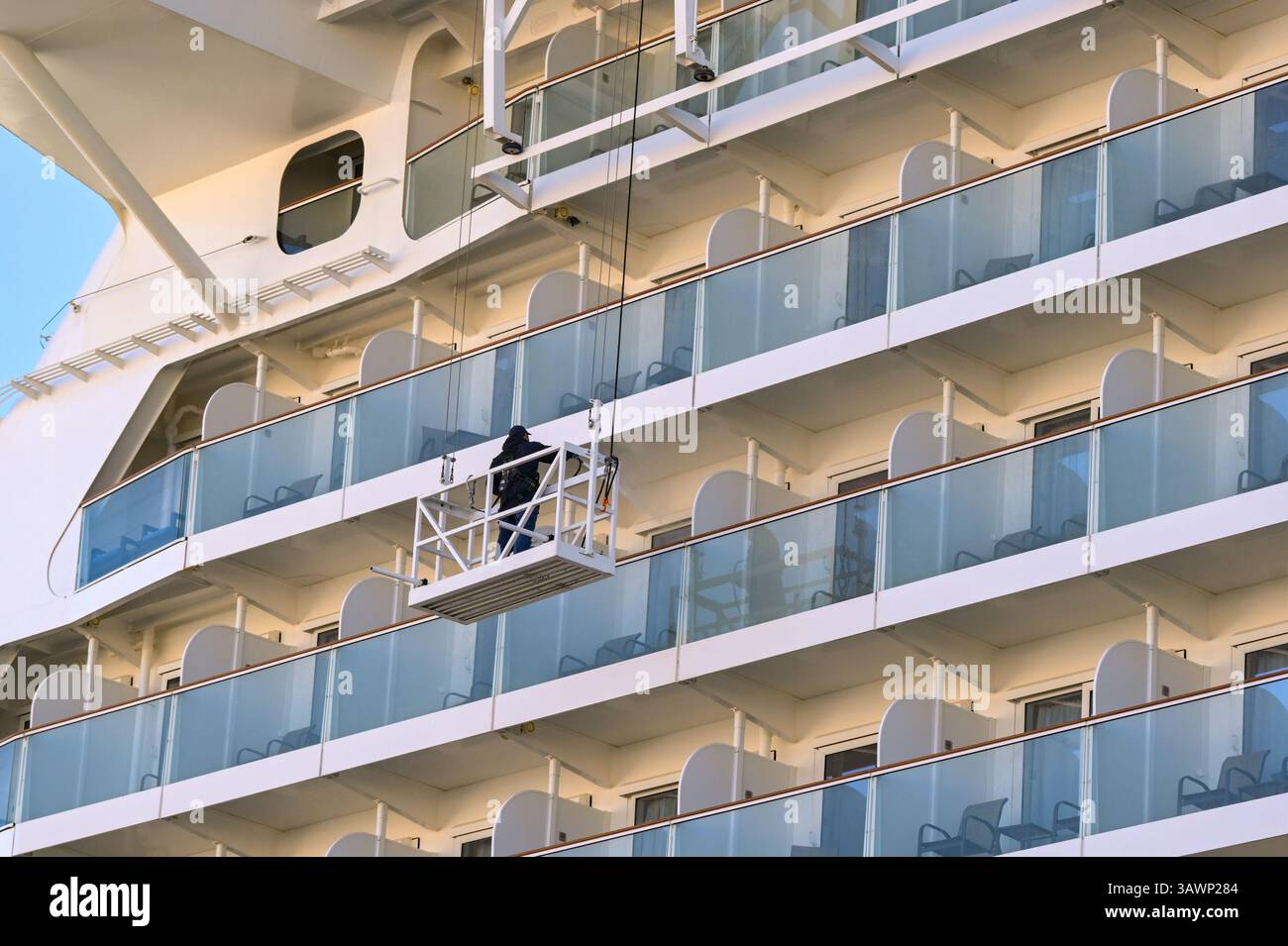 Lisbon, Portugal - 13 January 2025: Crew member standing on a cradle ...