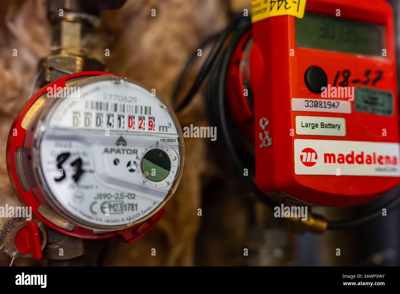 Close Up of Water Metering Devices with Pipes and Wires Stock Photo - Alamy
