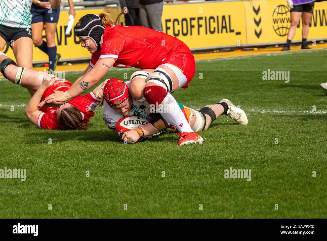 Newport, UK, 20th April 2025 Ireland number 8 Aoife Wafer scores a try ...