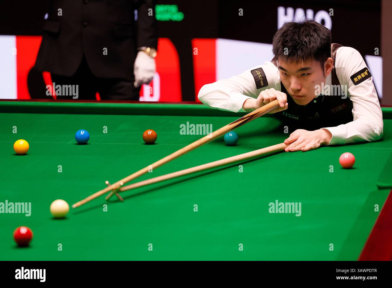 Fan Zhengyi during his match against Mark Allen (not pictured) during day two of the Halo World ...