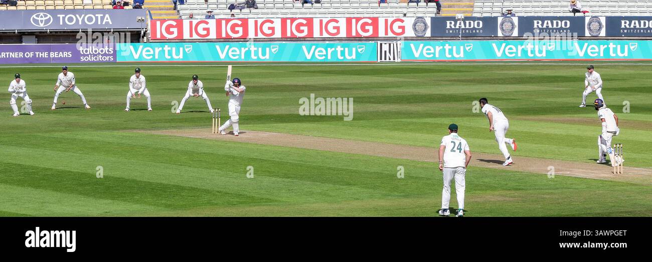 #17, Rob Yates of Warwickshire faces the bowling of #16, Brett Hutton ...