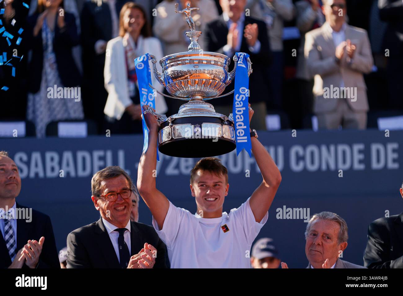 Denmark's Holger Rune lifts the trophy after the ATP Barcelona Open ...