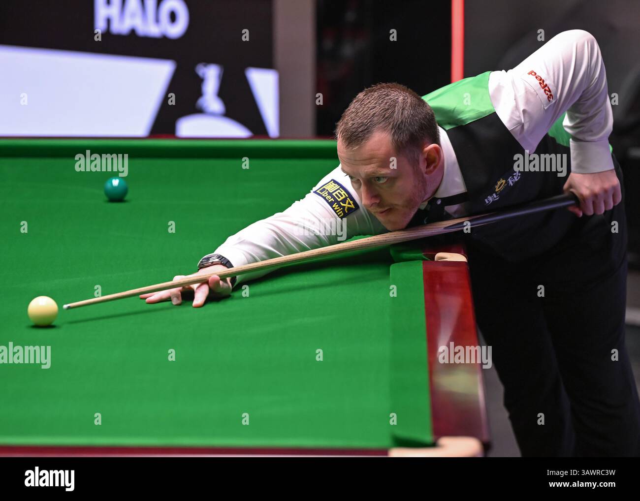 Sheffield, England, 20th April 2025. Mark Allen takes a shot during his ...