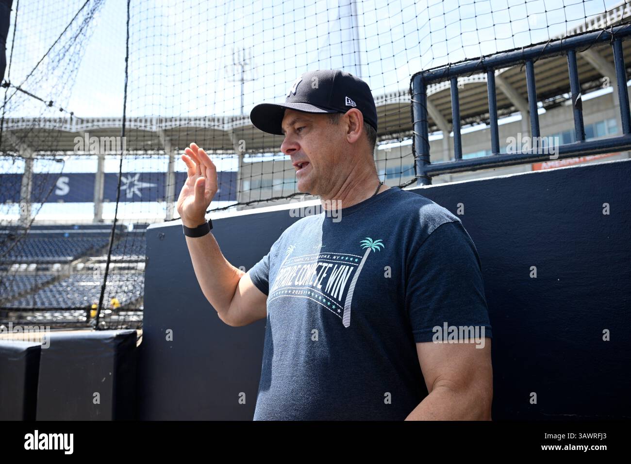 New York Yankees manager Aaron Boone talks with reporters before a ...