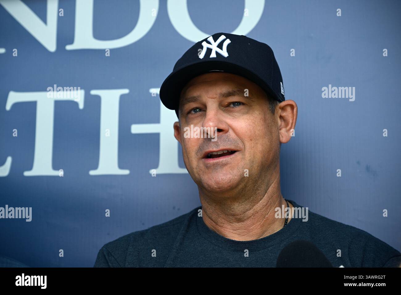 New York Yankees manager Aaron Boone talks with reporters before a ...