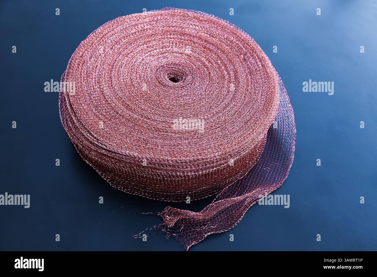 Copper mesh, twisted into a roll, close up. Twisted copper mesh Stock ...