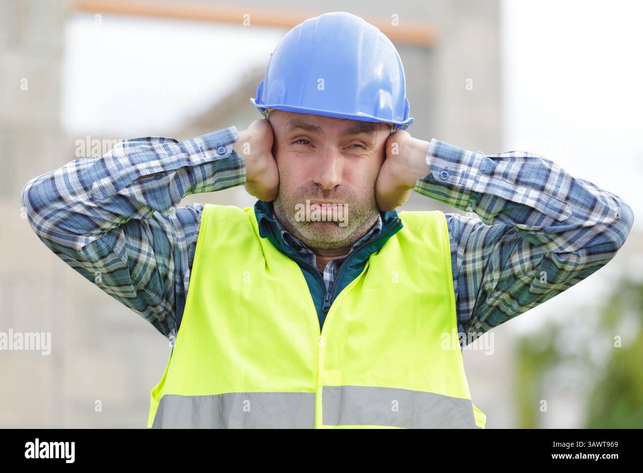 construction suffering from noise pollution on building site Stock ...