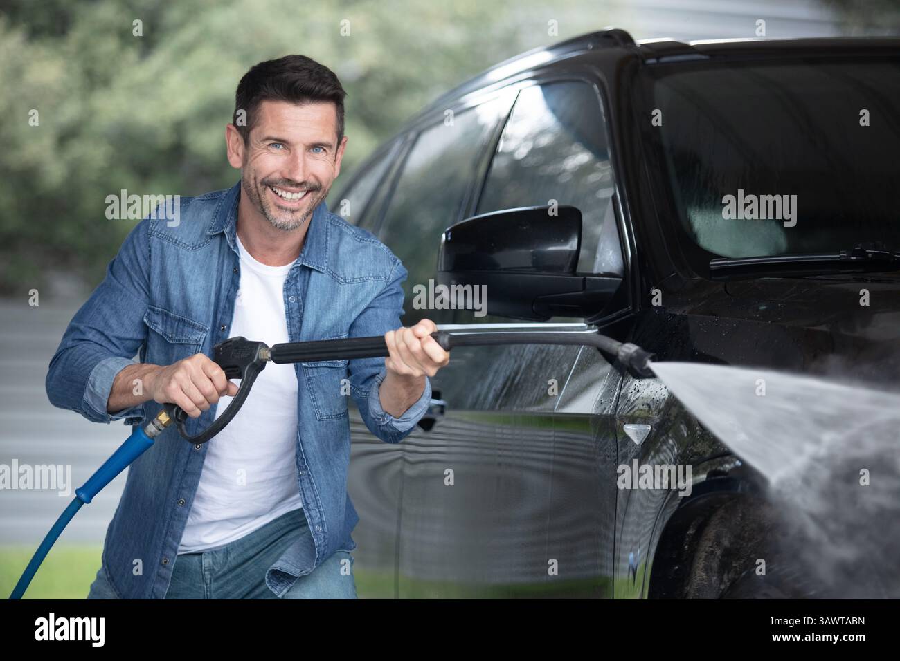 Water nozzle spraying car wash hi-res stock photography and images - Alamy