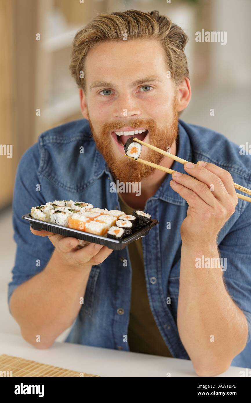 Man eating sushi hi-res stock photography and images - Alamy