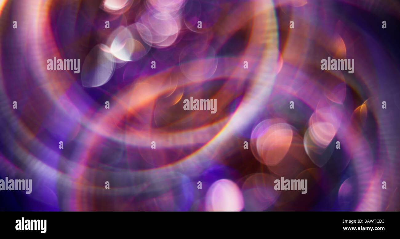 Defocused light. Rays flares. Bright sparkling purple color particles ...