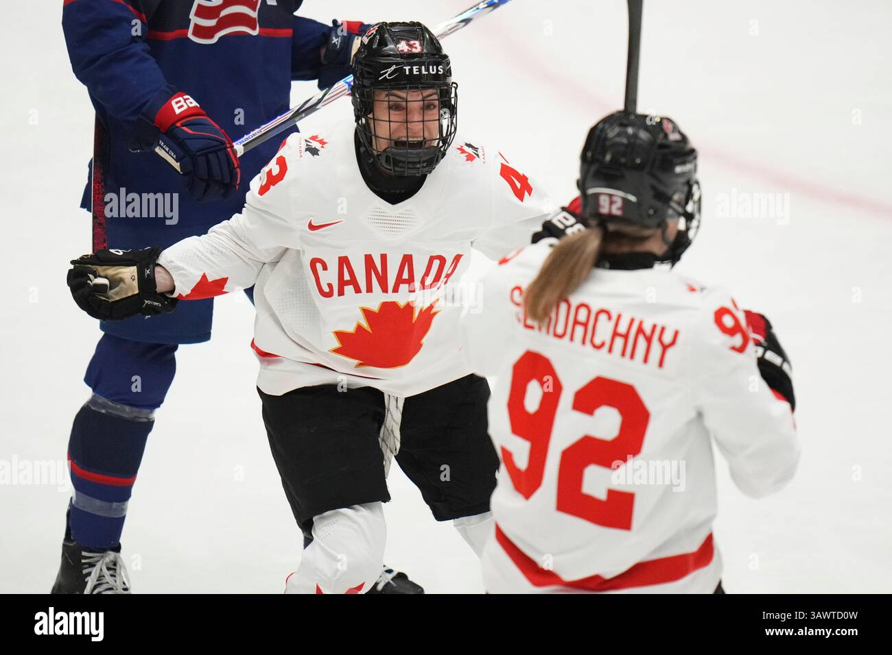 Canada's Kristin O'Neill and Danielle Serdachny celebrate a goal during ...