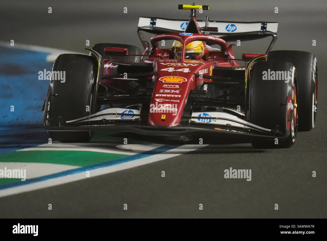 Ferrari driver Lewis Hamilton of Britain steers his car during the ...