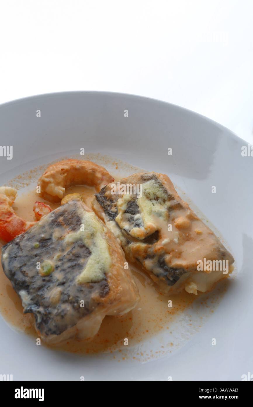 fresh cod fish receipt ready to eat as sea food dish Stock Photo - Alamy