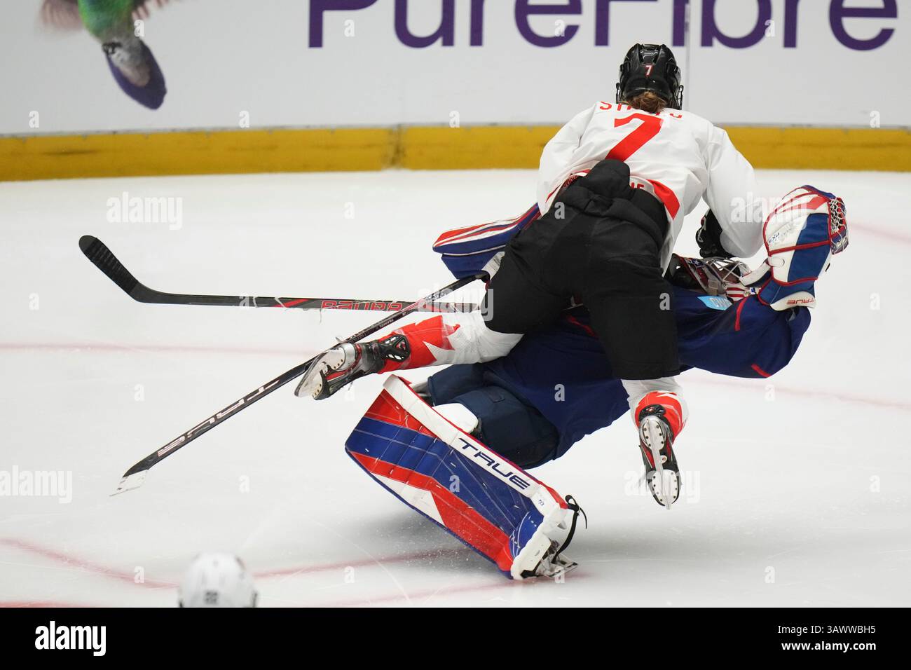 Canada's Laura Stacey collides with United States' goalkeeper Aerin ...