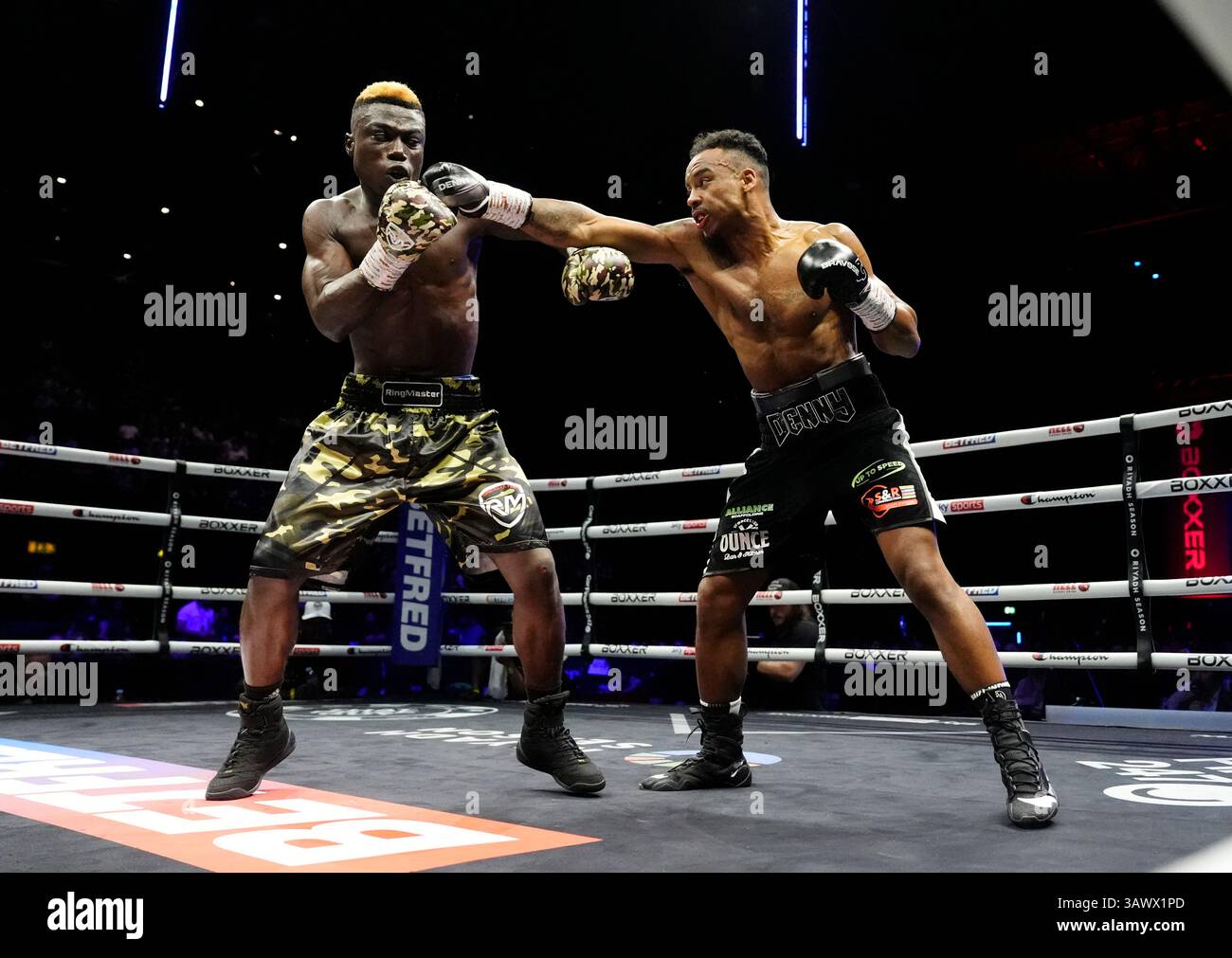 Tyler Denny (right) in action against Elvis Ahorgah (left) at BP Pulse ...