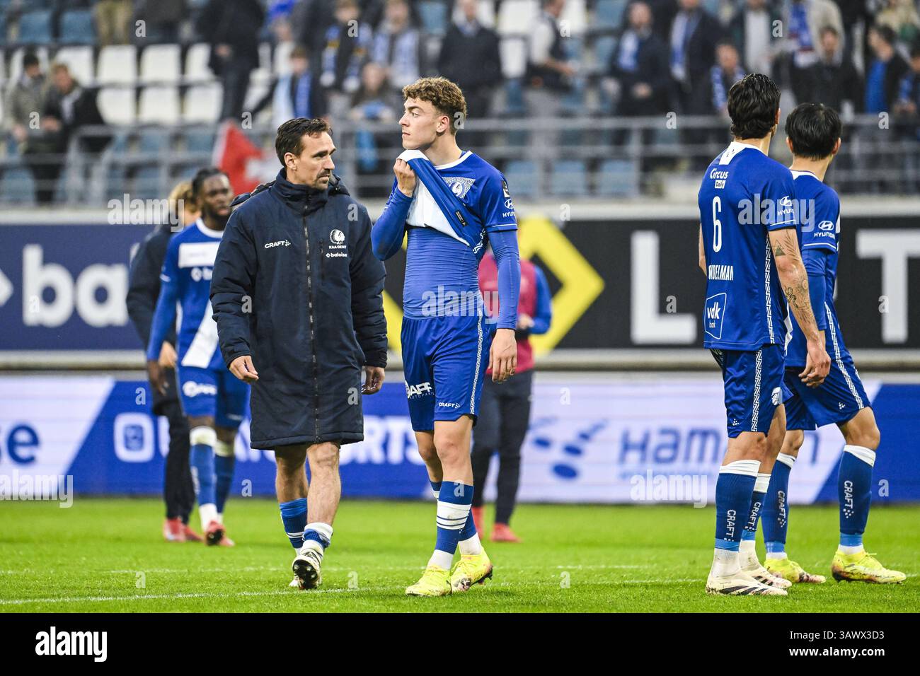 Gent, Belgium. 20th Apr, 2025. Gent's Sven Kums and Gent's Mathias ...