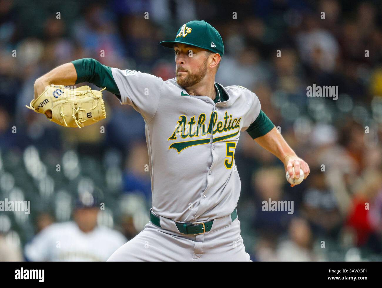Athletics starting pitcher Jeffrey Springs throws to the Milwaukee ...