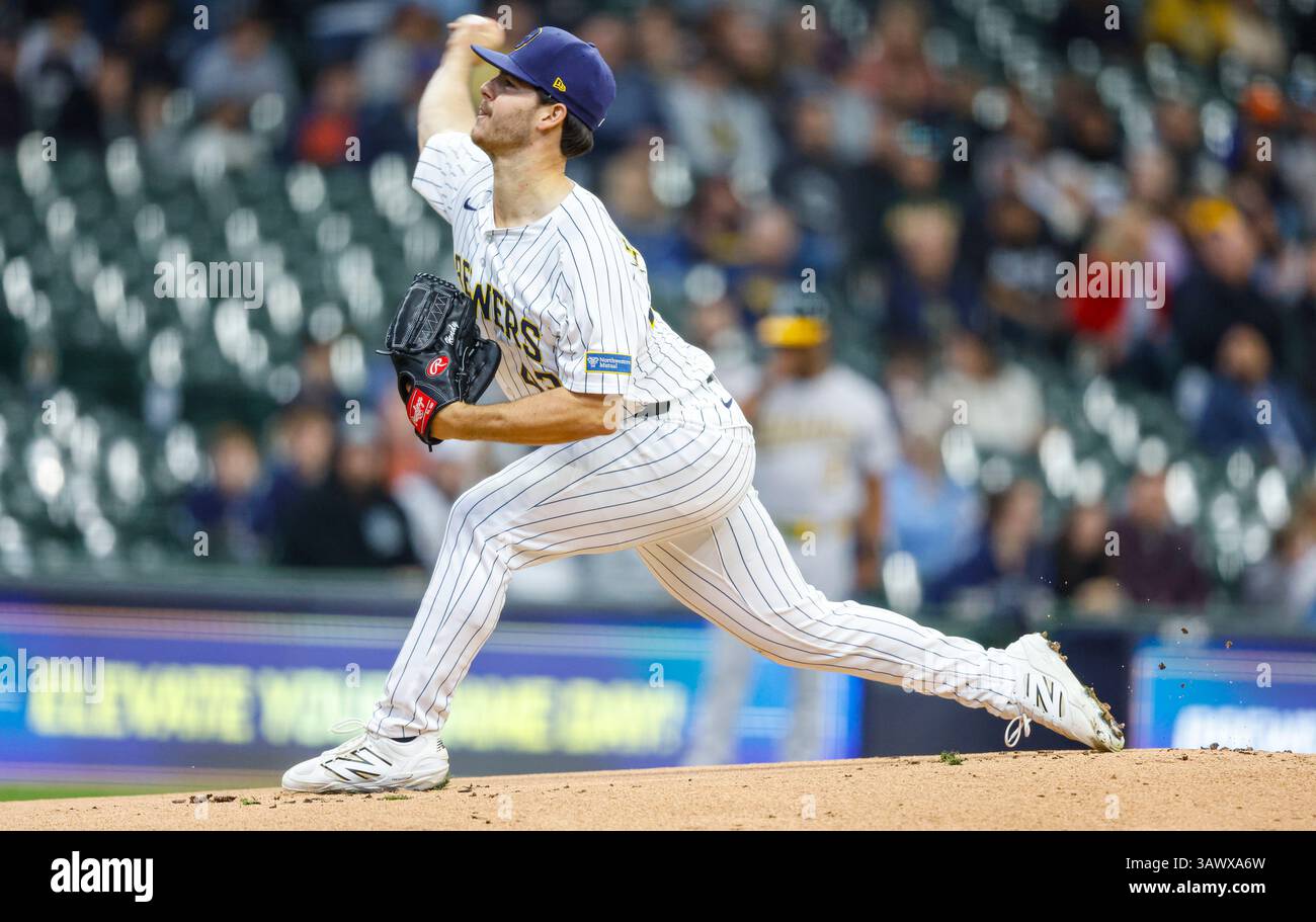 Milwaukee Brewers starting pitcher Logan Henderson throws to the ...