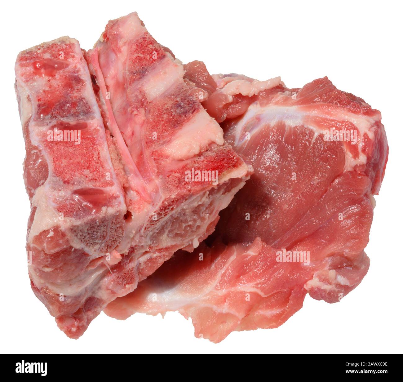 A cut section of raw pork bones with some attached meat and fat ...