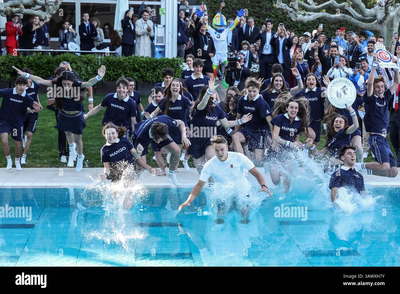 Holger Rune of Denmark jumps into the pool after winning the final ...