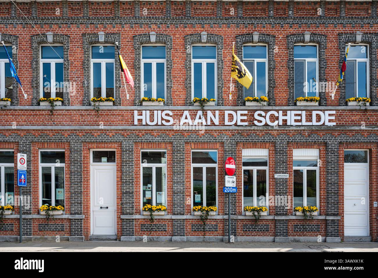 The town hall, a traditional brick stone building of the village of ...