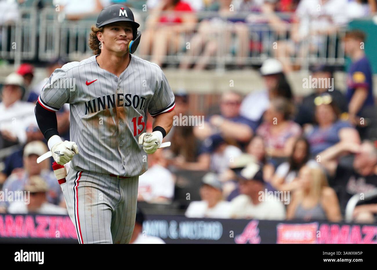 Minnesota Twins designated hitter Luke Keaschall (15) reacts after a ...