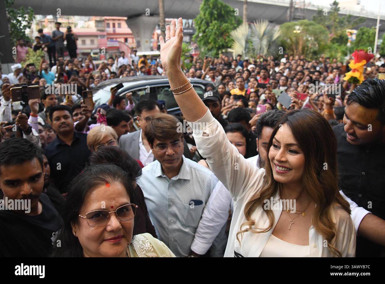 PATNA, INDIA - APRIL 20: Bollywood actress Mahima Choudhary waving her ...