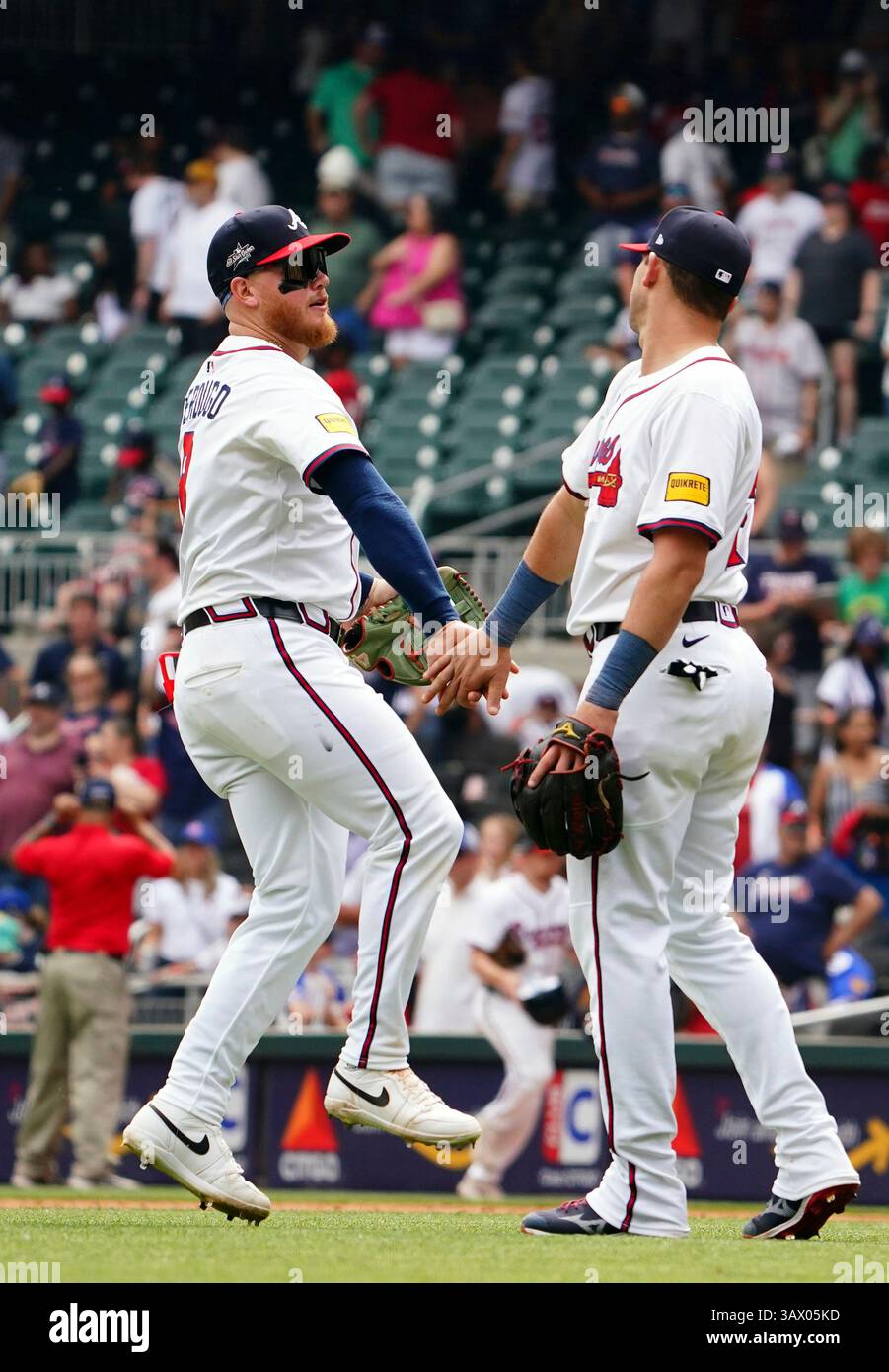 Atlanta Braves outfielder Alex Verdugo (8) and third baseman Austin ...